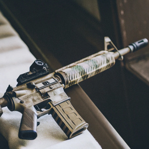 High-tech rifle render. M4 Carbine style, detailed camouflage finish ...