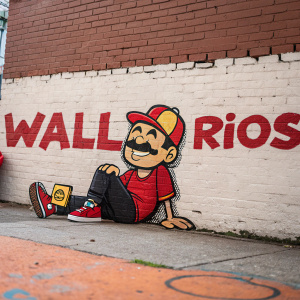 Character in a casual, laid-back pose. Wearing a red t-shirt ...