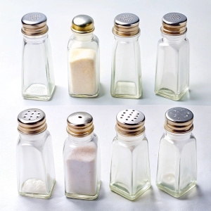 Various angles of an empty salt shaker on a white background - Recraft